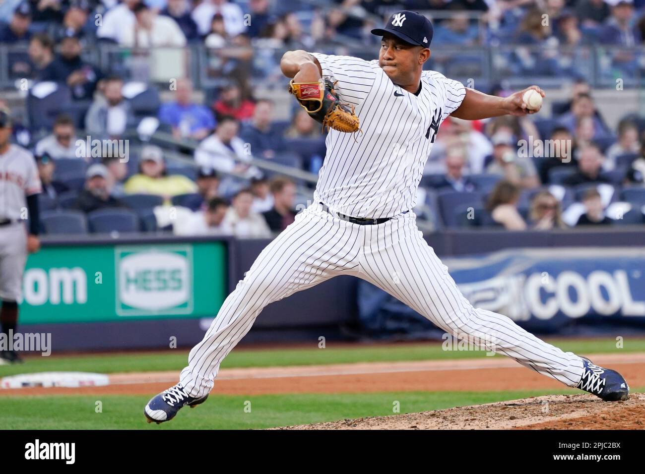 New York Yankees pitcher Clarke Schmidt delivers against the San ...