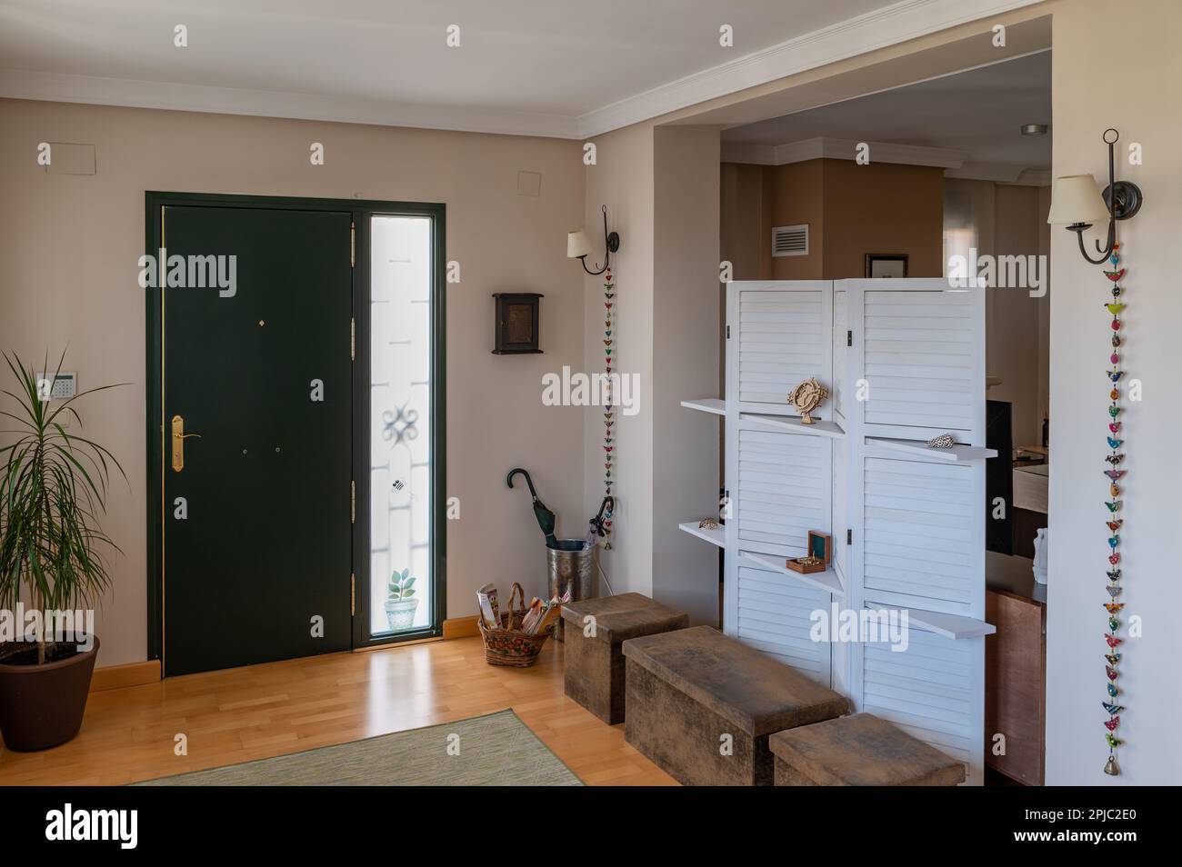 Bright entrance hall of a house Stock Photo - Alamy