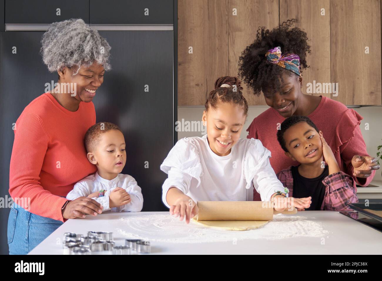 African boy flour rolling pin hi-res stock photography and images - Alamy