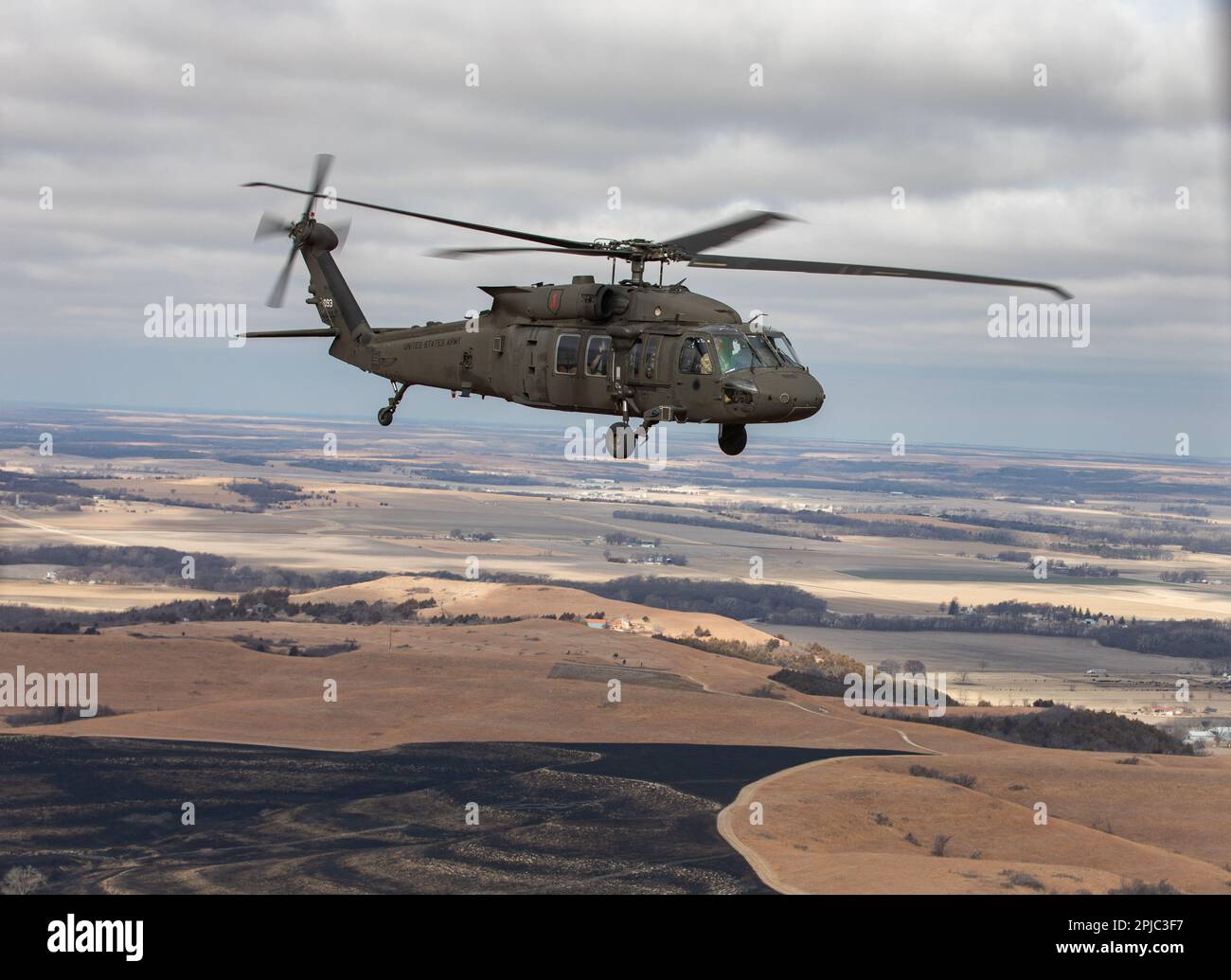 A UH-60 Black Hawk helicopter flies over the Flint Hills region en ...