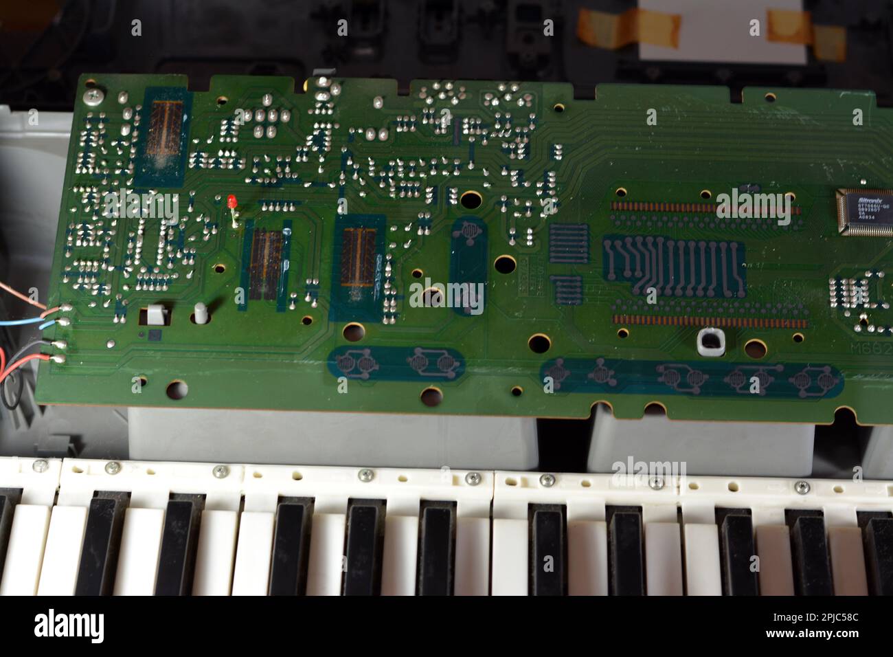 Cairo, Egypt, April 1 2023: Broken electronic musical keyboard, cracked ...