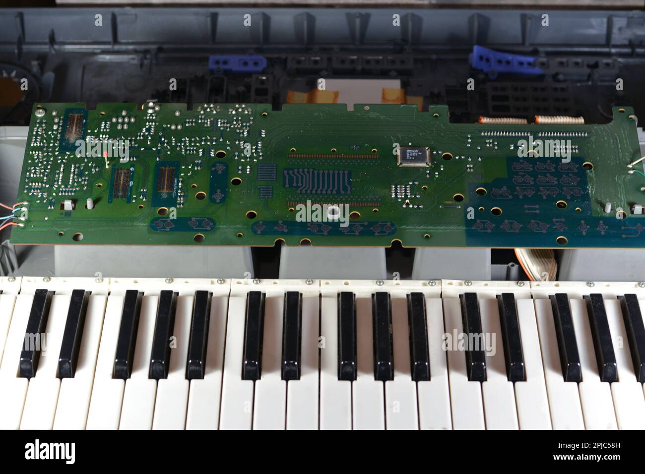 Cairo, Egypt, April 1 2023: Broken electronic musical keyboard, cracked ...