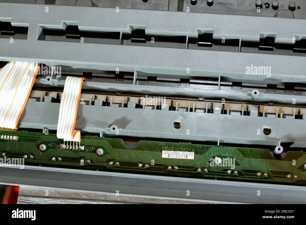Cairo, Egypt, April 1 2023: Broken electronic musical keyboard, cracked ... Cairo, Egypt, April 1 2023: Broken electronic musical keyboard, cracked ...