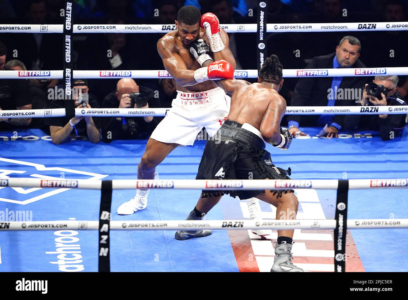 Jermaine Franklin (bottom) strikes Anthony Joshua in the International ...