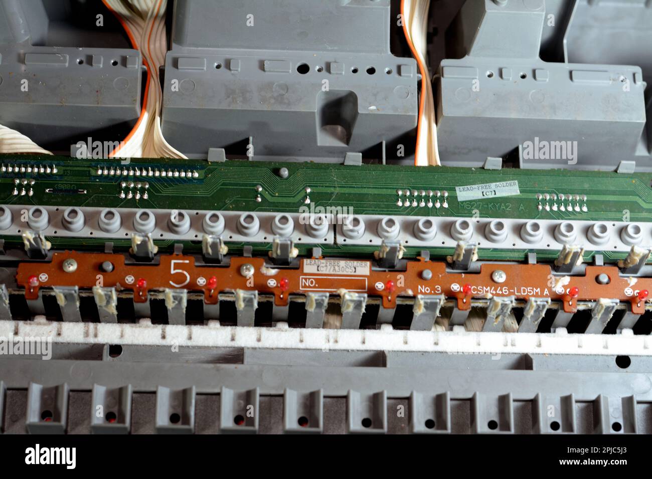 Cairo, Egypt, April 1 2023: Broken electronic musical keyboard, cracked ...