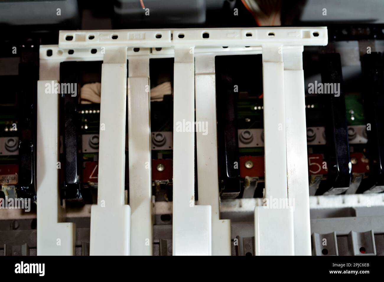 Cairo, Egypt, April 1 2023: Broken electronic musical keyboard, cracked ... Cairo, Egypt, April 1 2023: Broken electronic musical keyboard, cracked ...