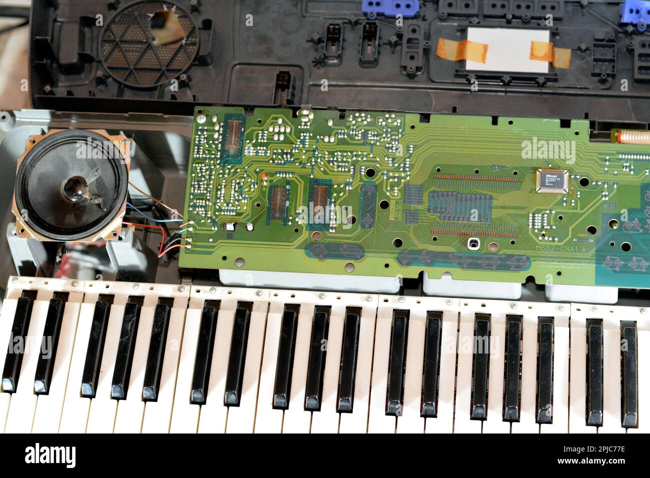 Cairo, Egypt, April 1 2023: Broken electronic musical keyboard, cracked ...