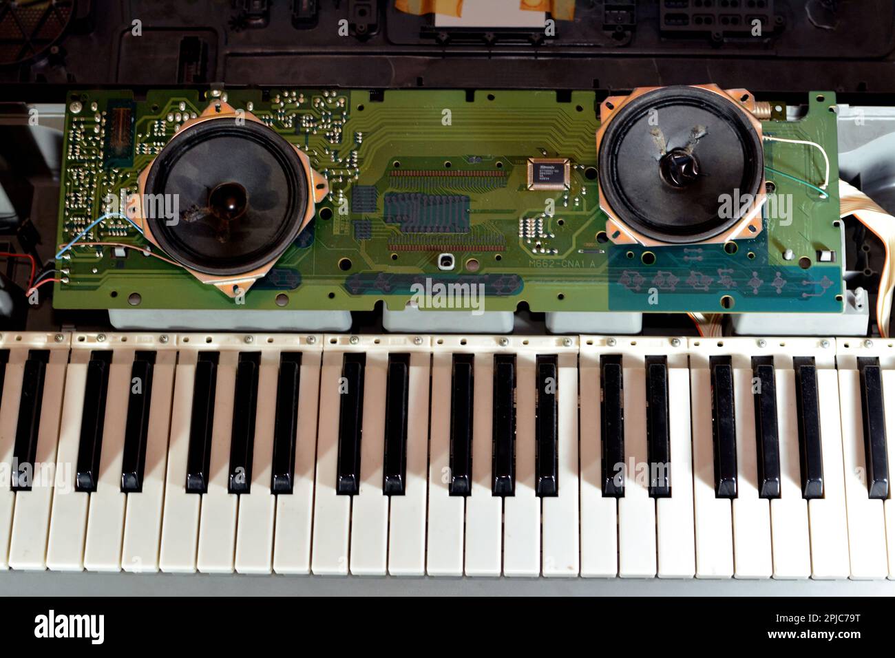 Cairo, Egypt, April 1 2023: Broken electronic musical keyboard, cracked ... Cairo, Egypt, April 1 2023: Broken electronic musical keyboard, cracked ...