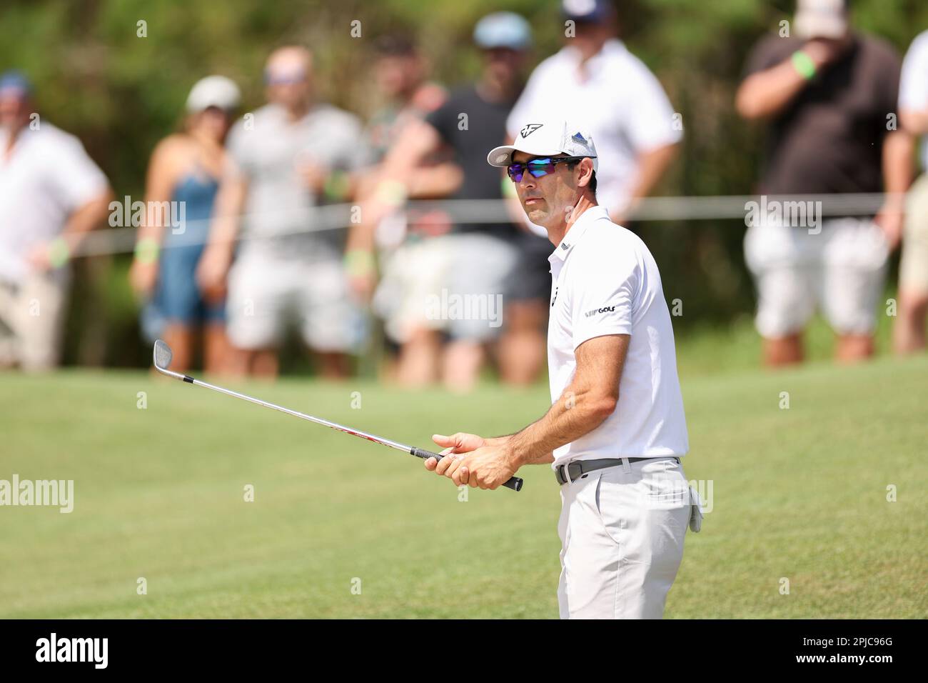 Cameron Tringale of HyFlyers GC hits his shot from a bunker on the 12th ...