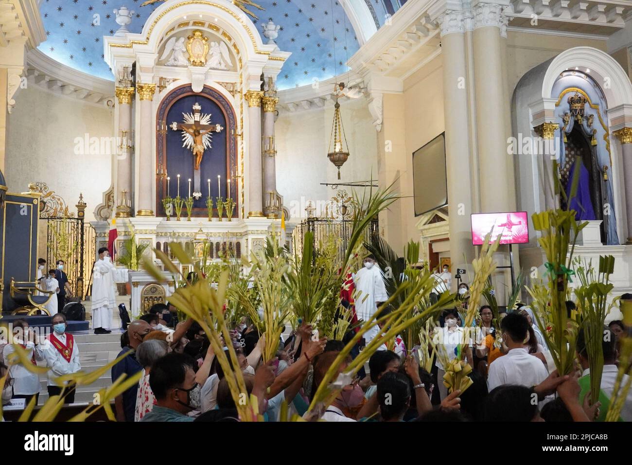 Quezon City, Philippines. 2nd April, 2023. Filipino Catholics bring ...