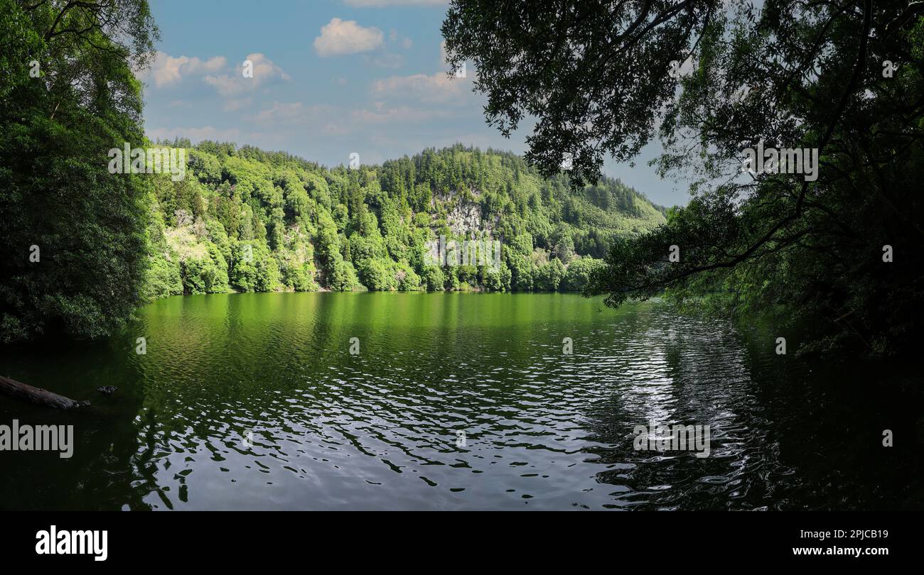 The peaceful Lagoa Do Congro is located at the end of an easy hike in ...