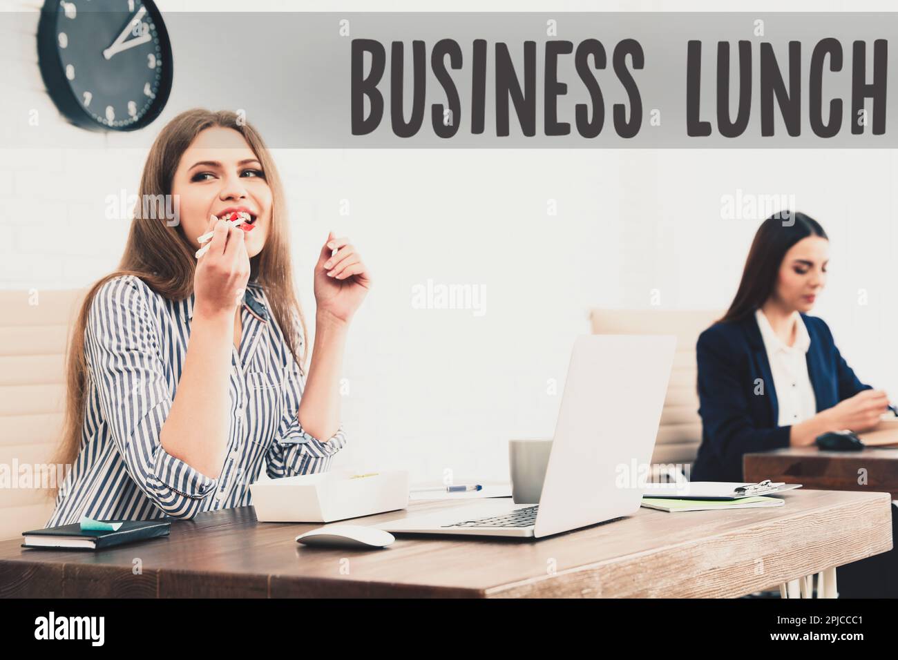 Office employees eating at workplace. Business lunch Stock Photo - Alamy