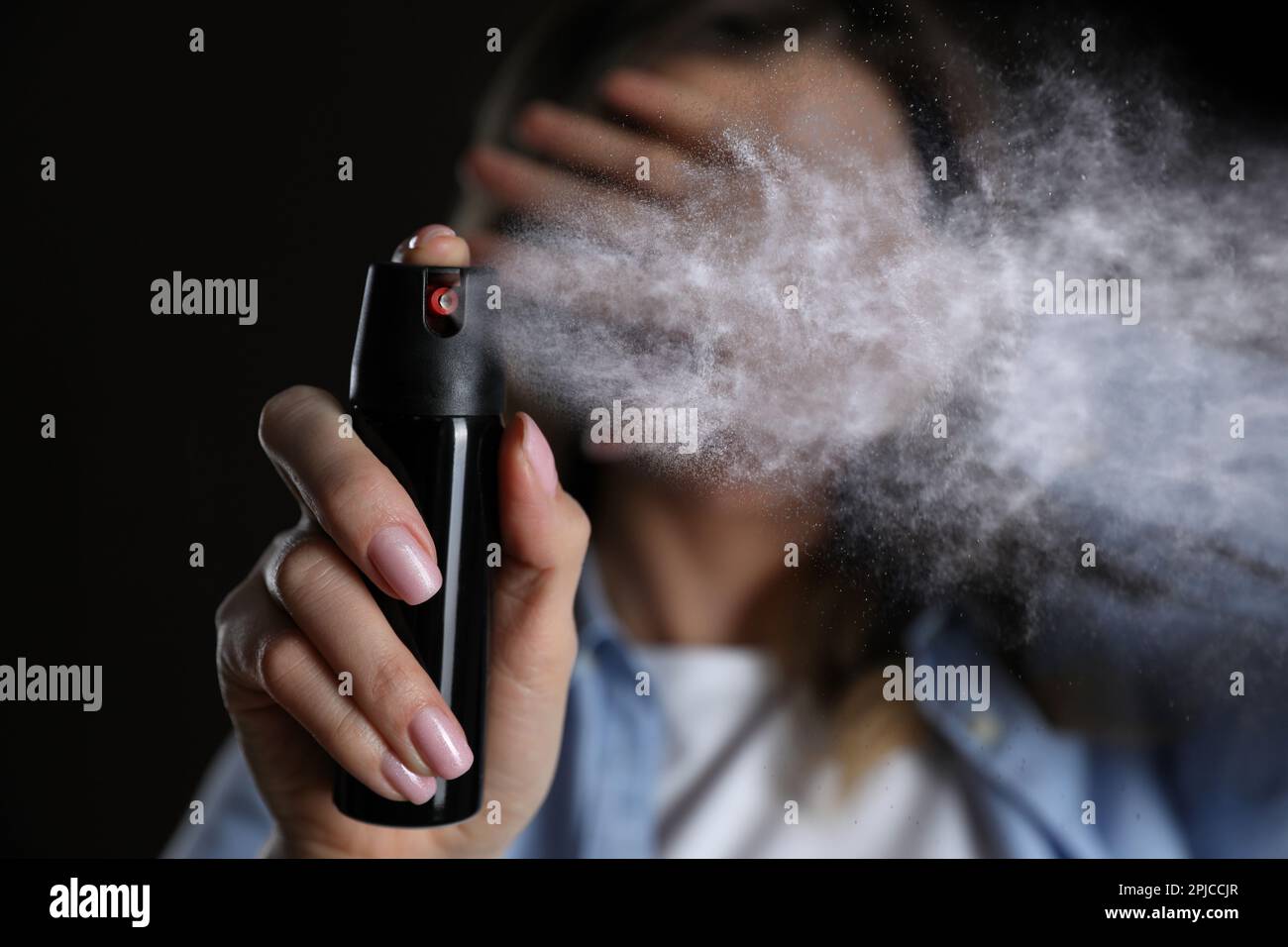 Black woman pepper spray hi-res stock photography and images - Alamy