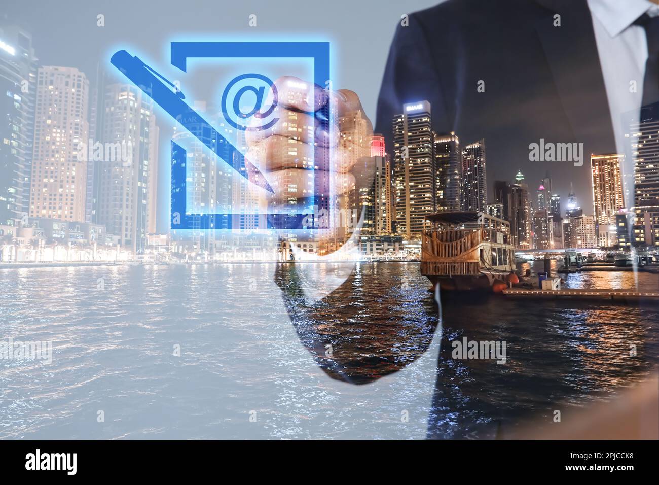 Electronic signature concept. Double exposure of businessman with pen ...