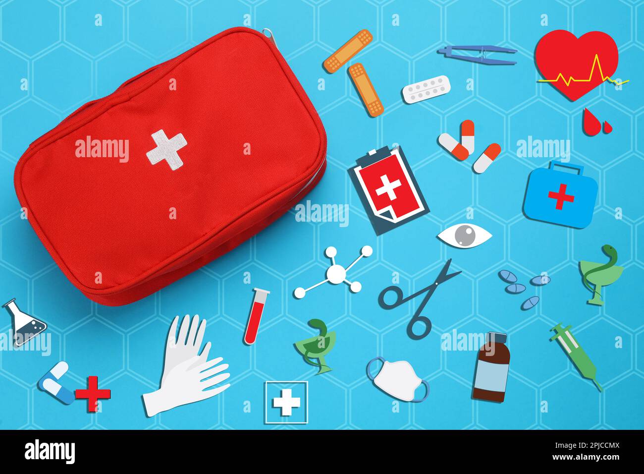 First aid kit bag and different images on light blue background, top ...