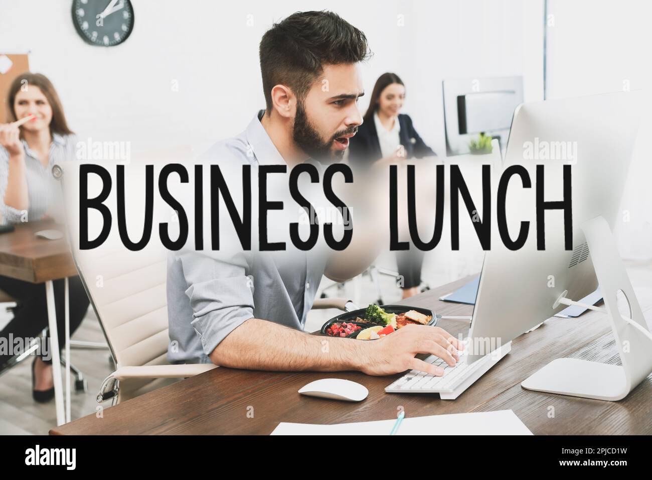 Office employees eating at workplace. Business lunch Stock Photo - Alamy