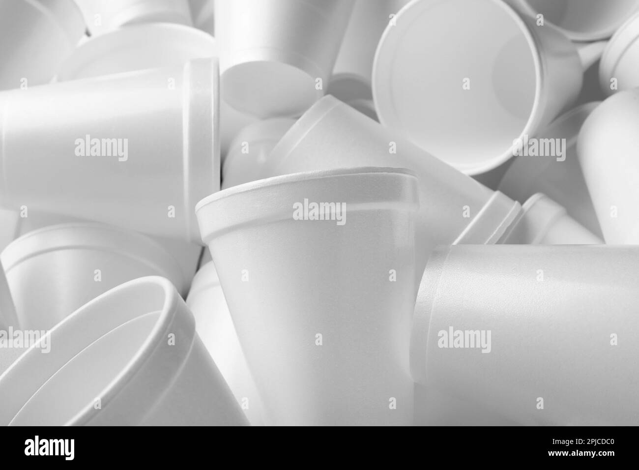 Heap of white styrofoam cups as background, closeup Stock Photo - Alamy