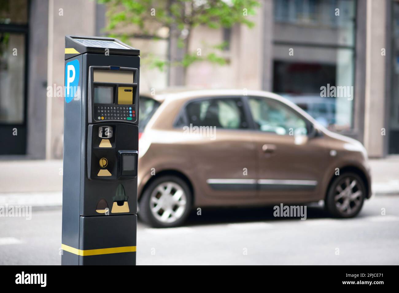 Parking meter on city street, space for text. Modern device Stock Photo ...