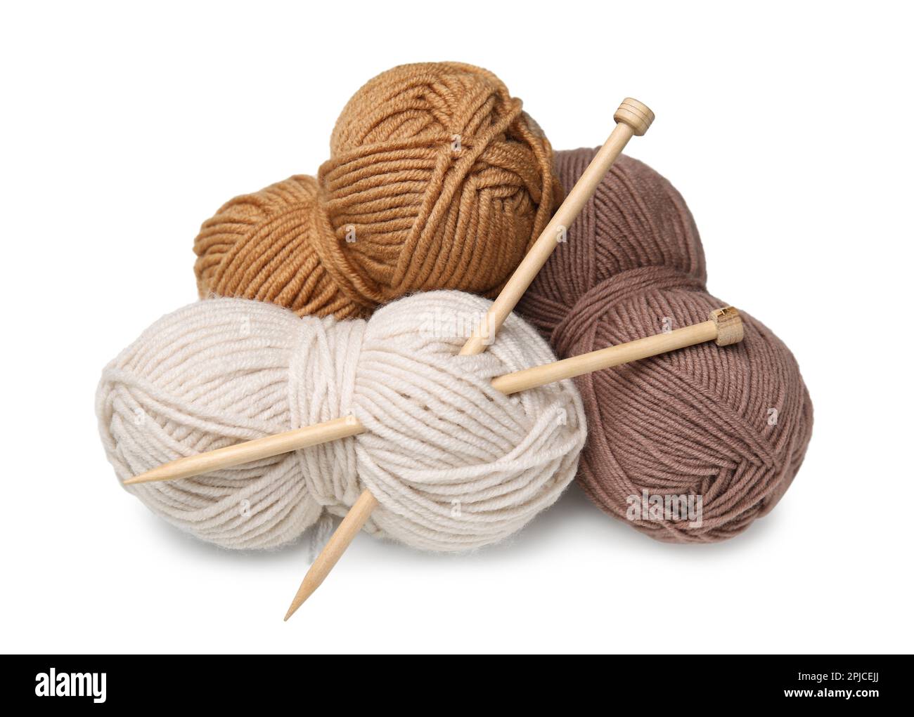 Soft woolen yarns and knitting needles on white background Stock Photo ...