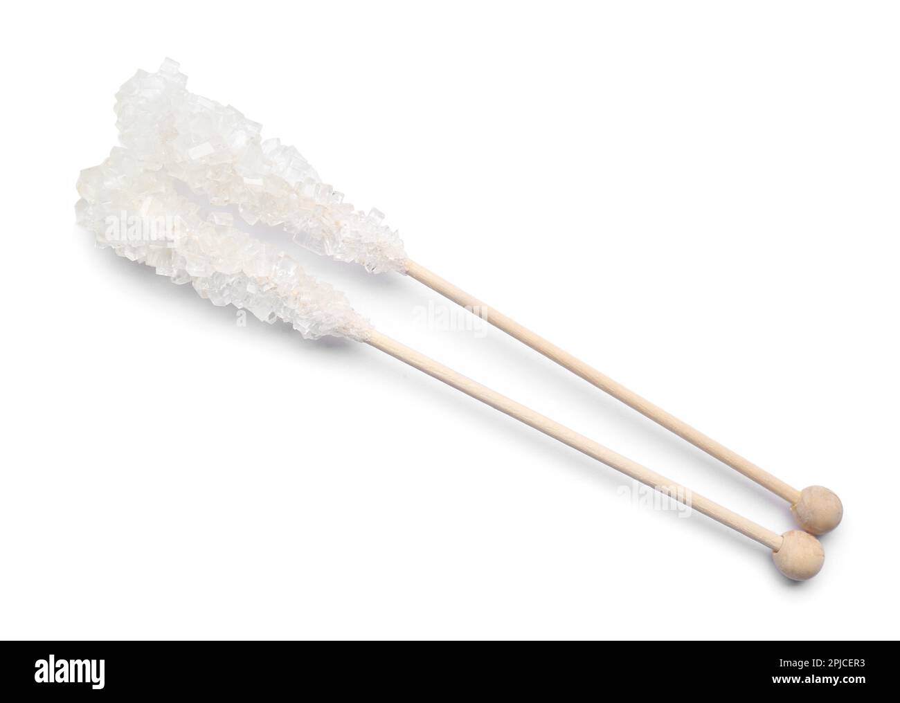 Wooden sticks with sugar crystals isolated on white, top view. Tasty ...