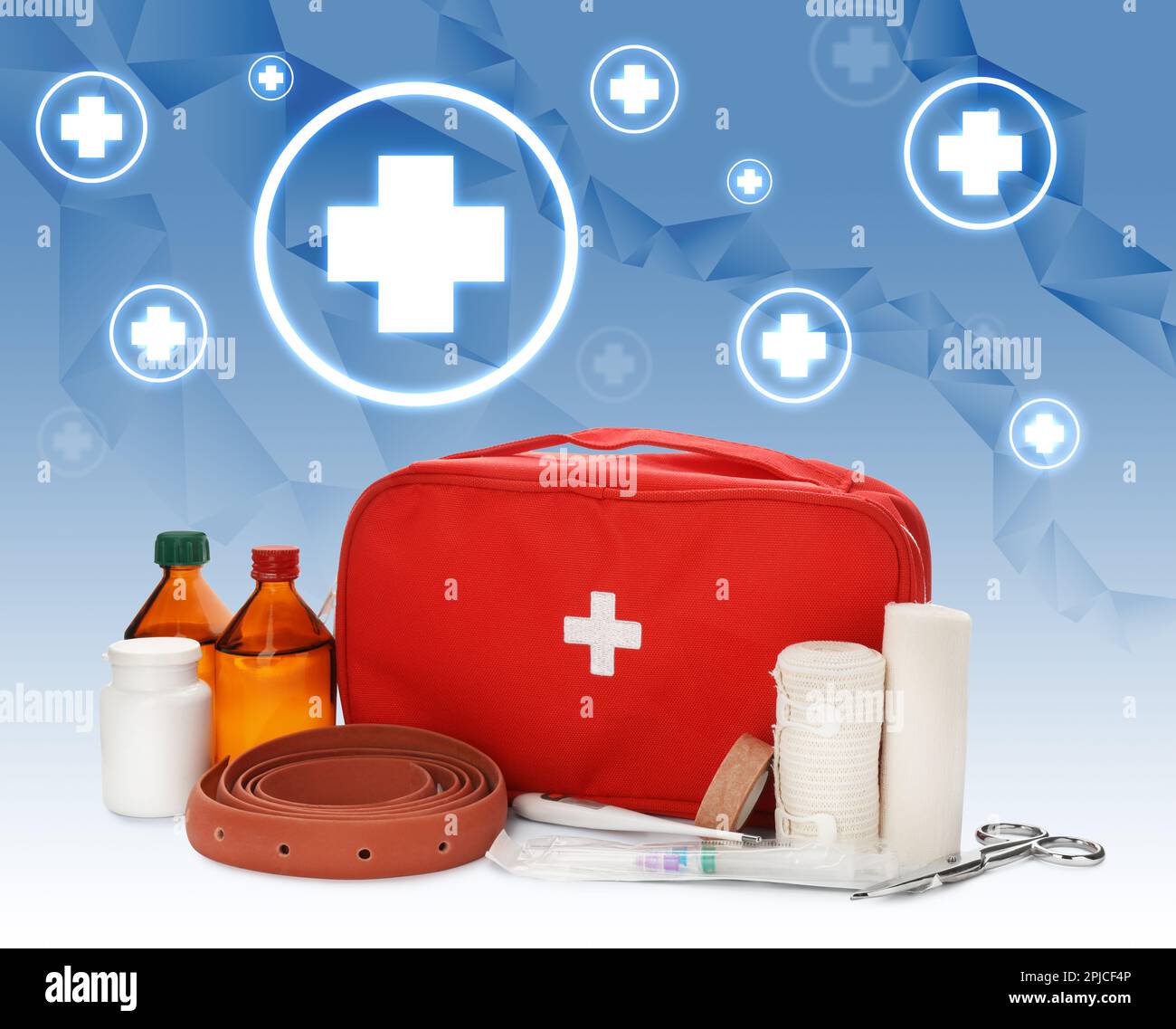 First aid kit and illustrations of cross symbols on blue background ...