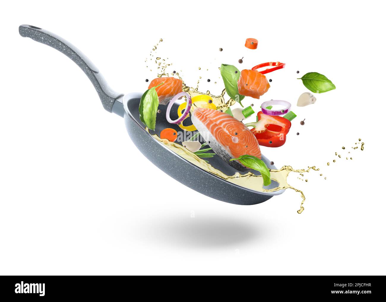 Cook frying fresh fish on Cut Out Stock Images & Pictures - Alamy