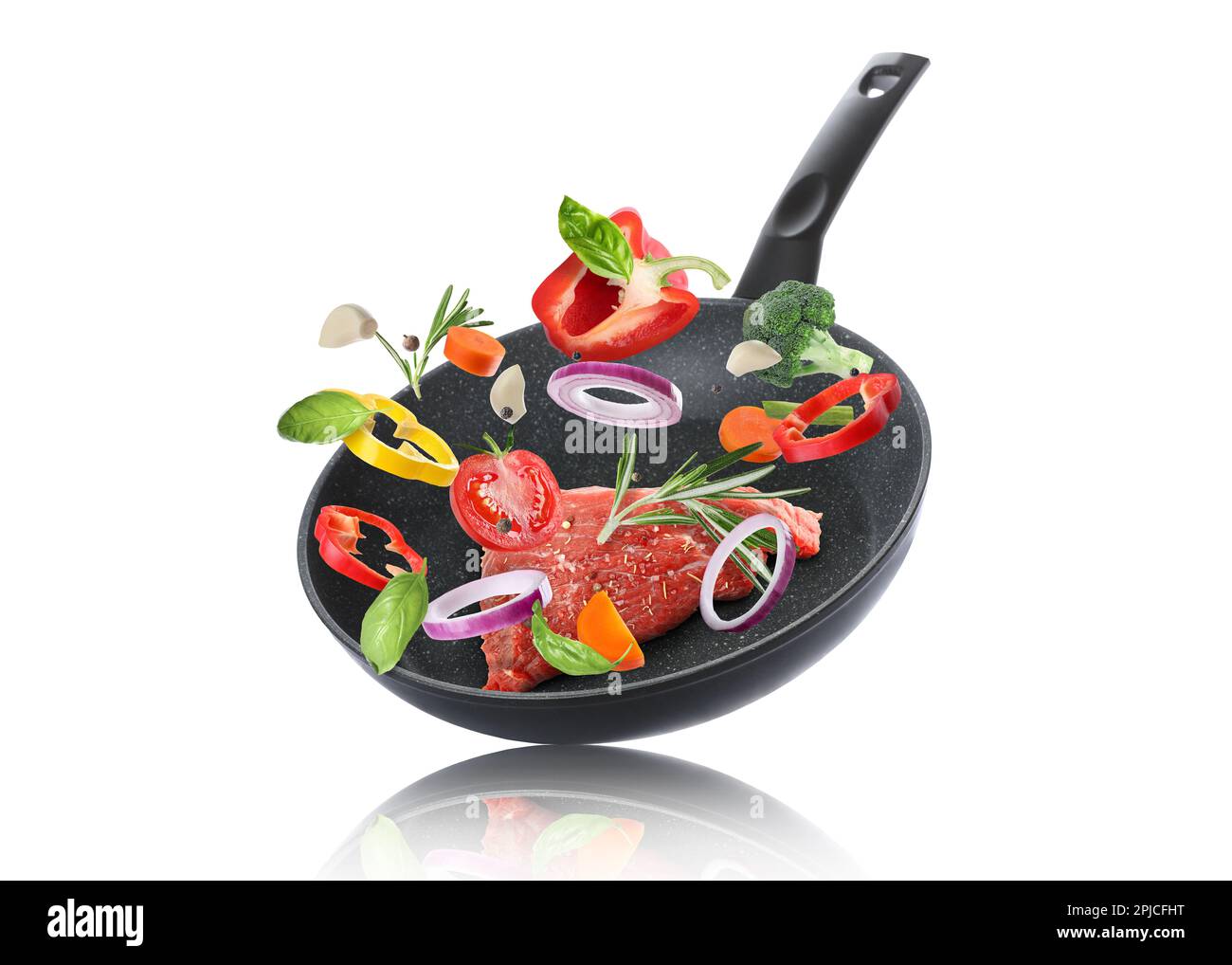 Tasty fresh ingredients and frying pan on white background Stock Photo ...
