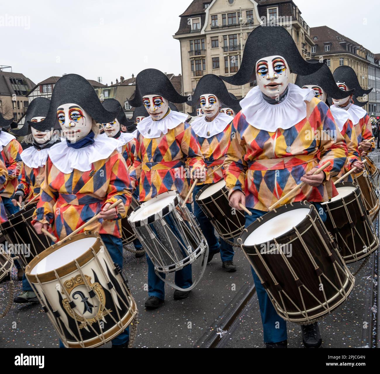 harlequin drummers at the Basel Switzerland Carnival or Fasnacht parade ...
