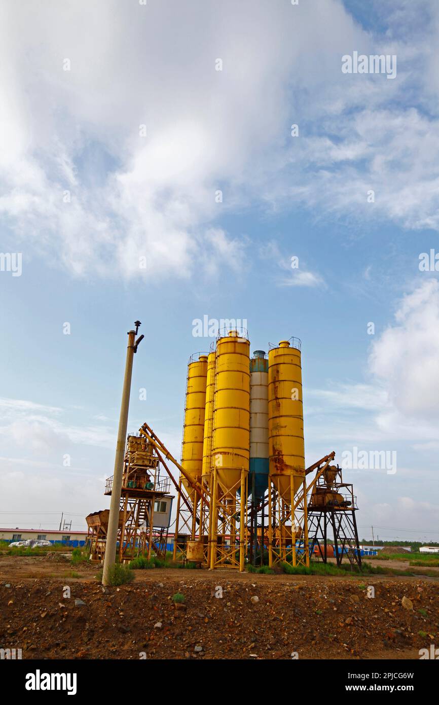 Concrete mixing silo, site construction facilities Stock Photo - Alamy