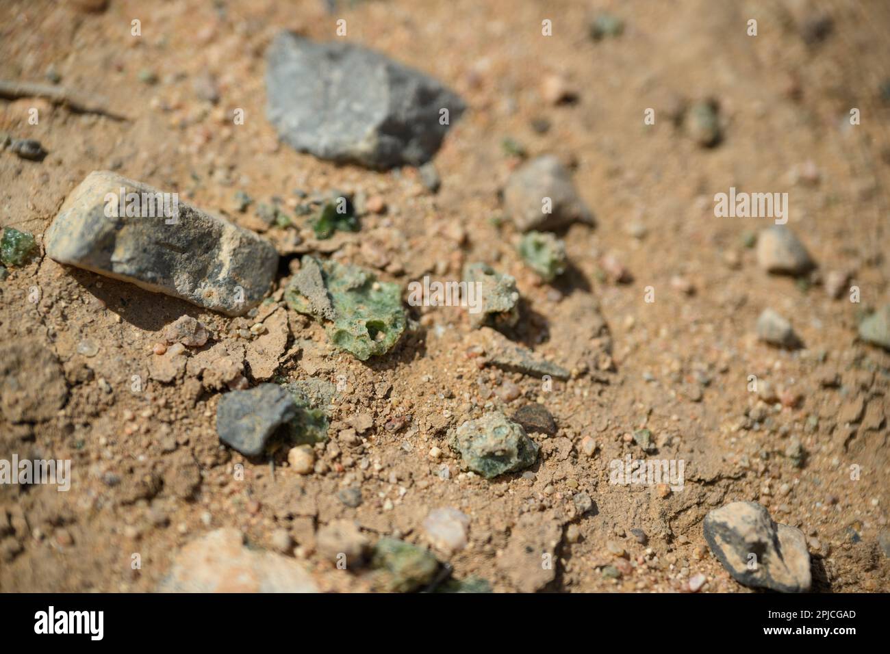 Pieces of Trinitite, a green glass-like substance that was created from ...