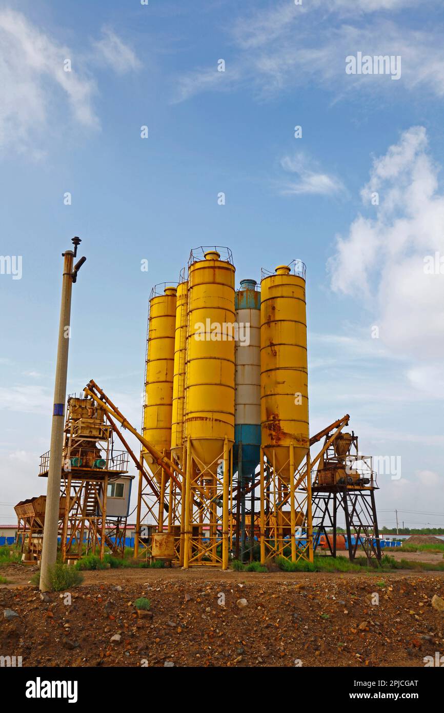 Concrete mixing silo, site construction facilities Stock Photo - Alamy