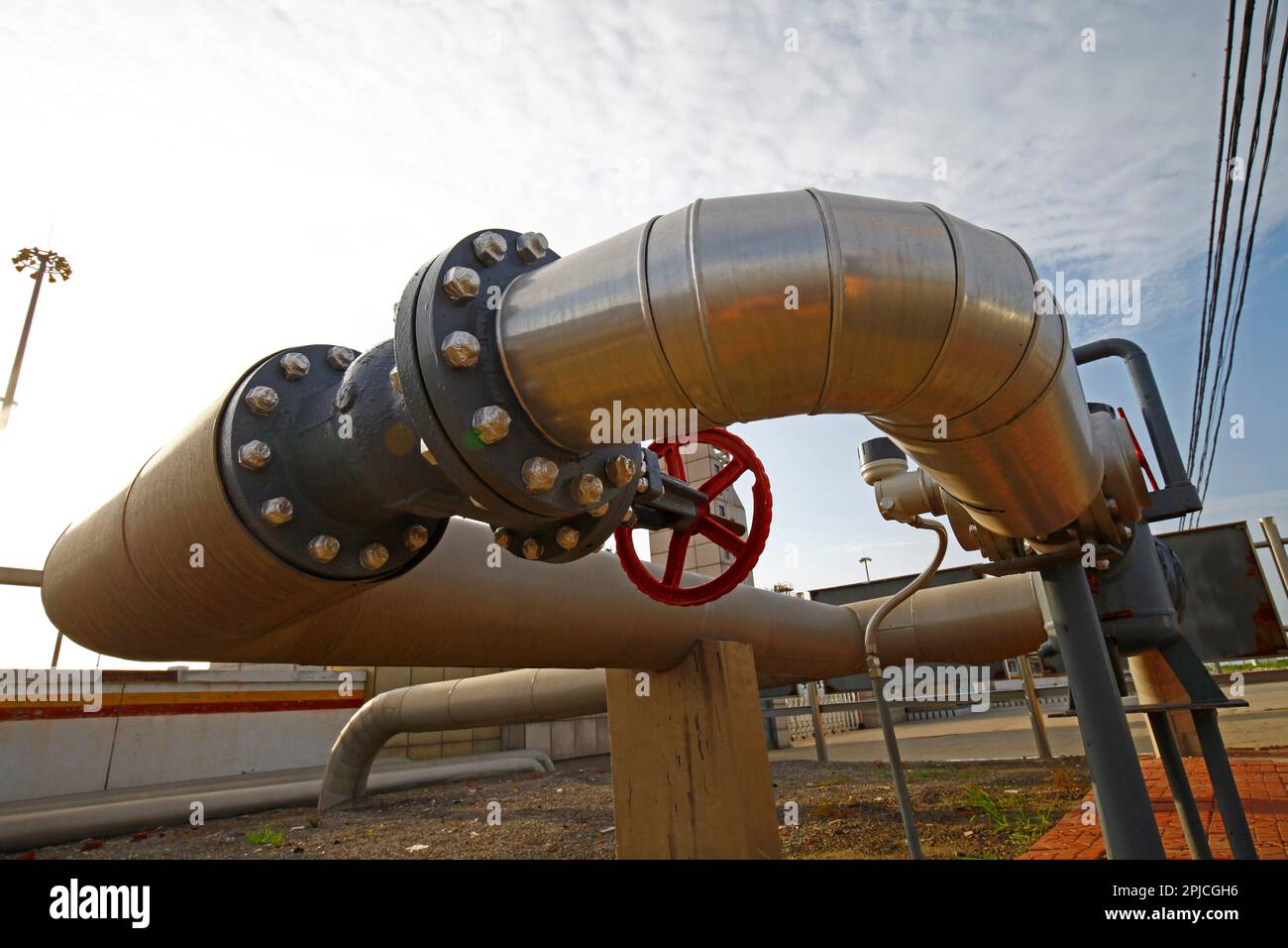 Oil pipes and valves Stock Photo - Alamy