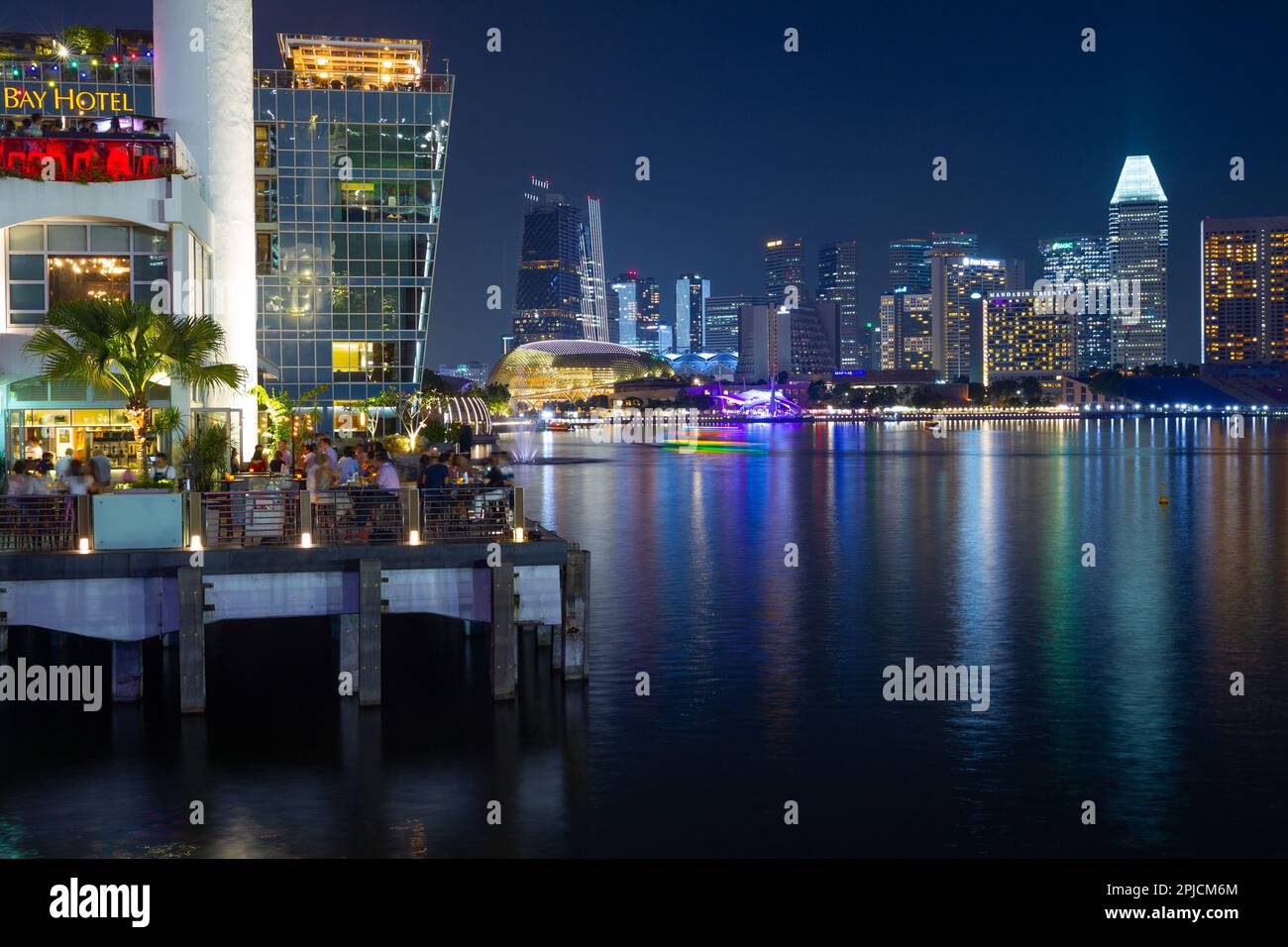 A night view of Marina Bay in Singapore. The 'Super Loco' bar and ...