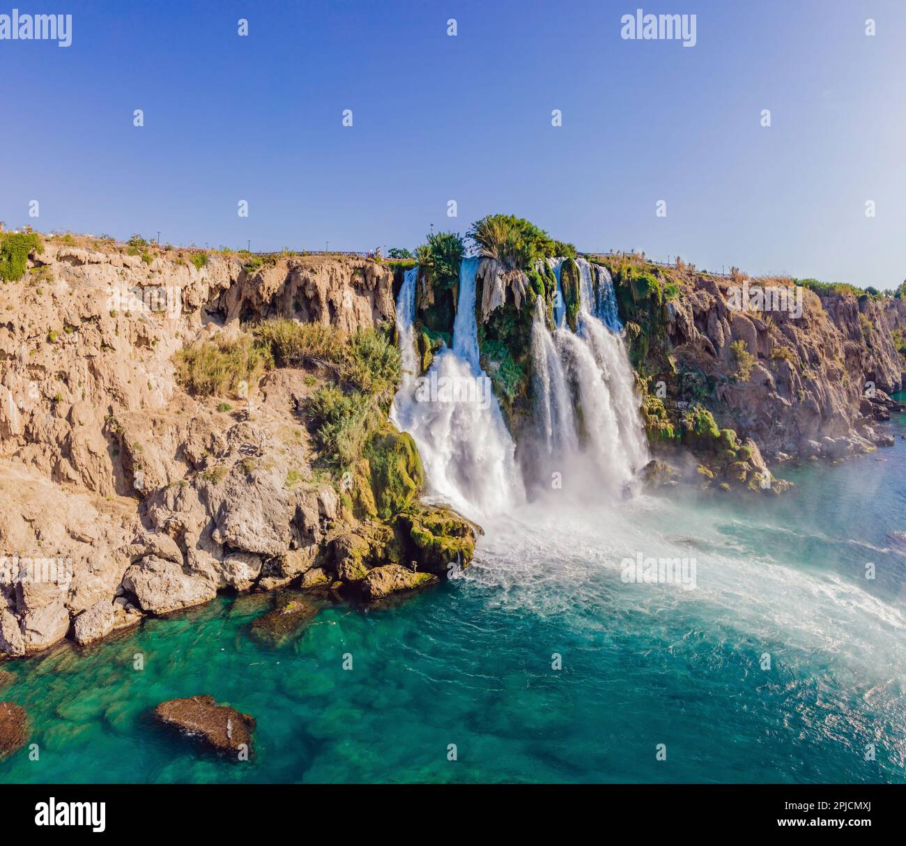 Lower Duden Falls drop off a rocky cliff falling from about 40 m into ...