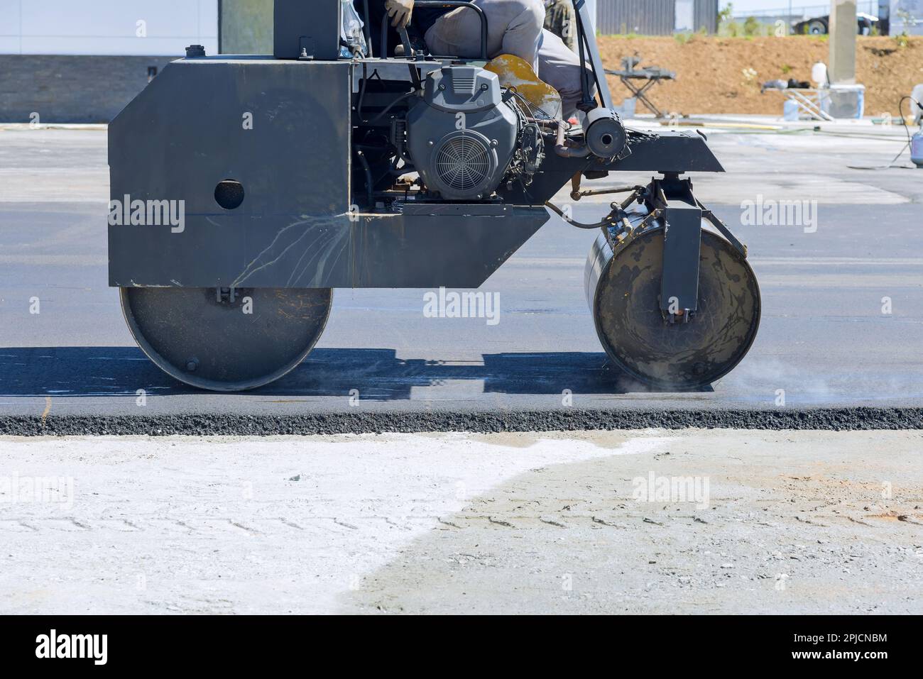 An asphalt paver machine steam roller will be used during construction ...