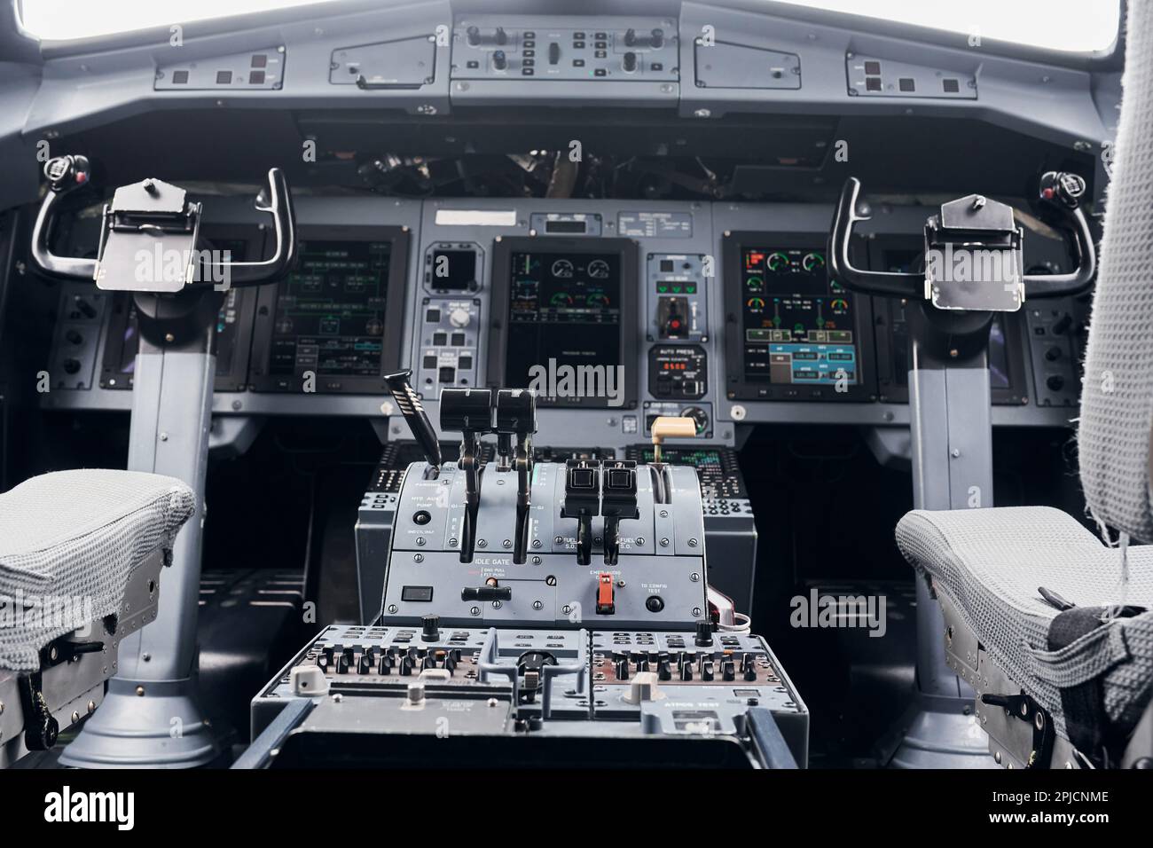 Knobs and buttons. Close up focused view of airplane cockpit Stock ...