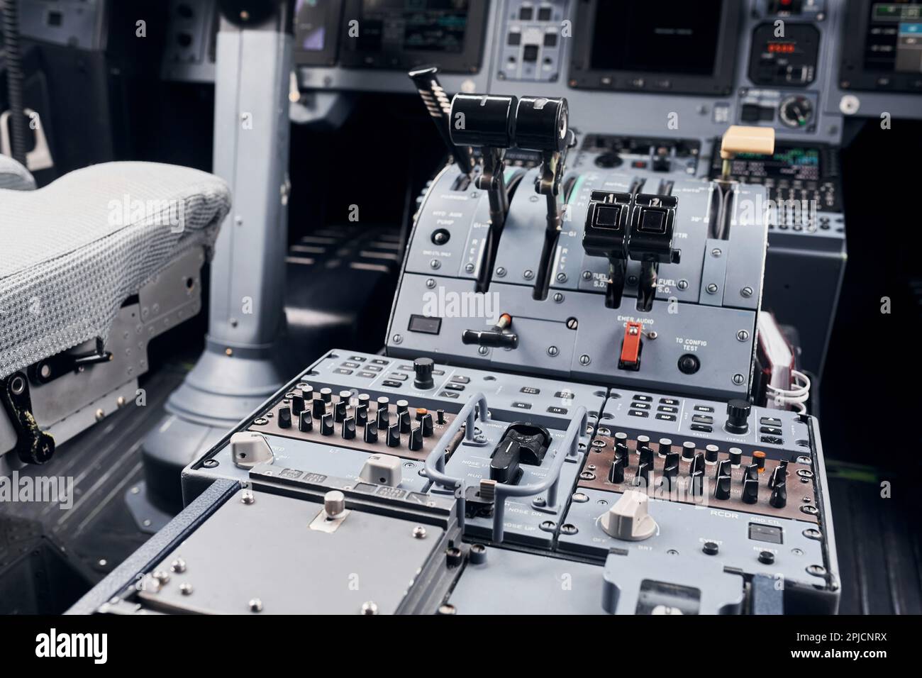 Knobs and buttons. Close up focused view of airplane cockpit Stock ...