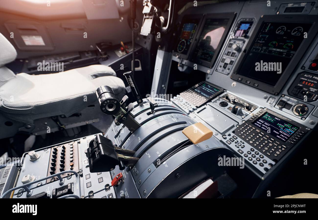Knobs and buttons. Close up focused view of airplane cockpit Stock ...