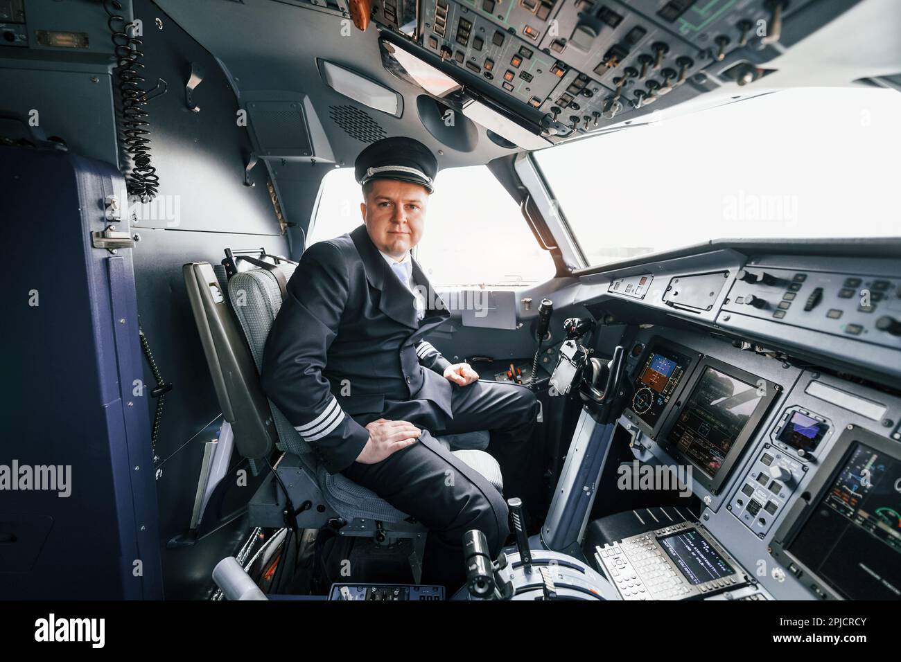 Pilot on the work in the passenger airplane. Preparing for takeoff ...