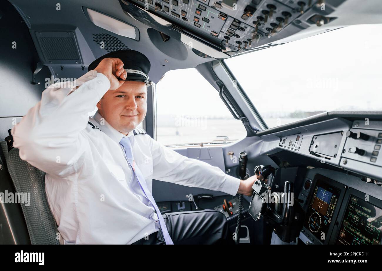 Pilot on the work in the passenger airplane. Preparing for takeoff ...