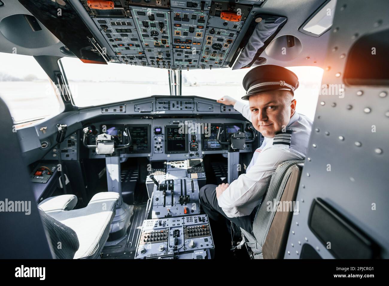 Professional airplane captain preparing flight hi-res stock photography ...