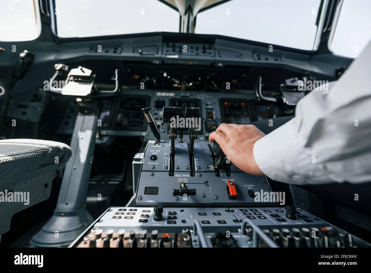 Pilot on the work in the passenger airplane. Preparing for takeoff ...