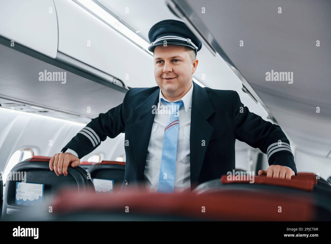 Professional pilot in uniform hi-res stock photography and images - Alamy