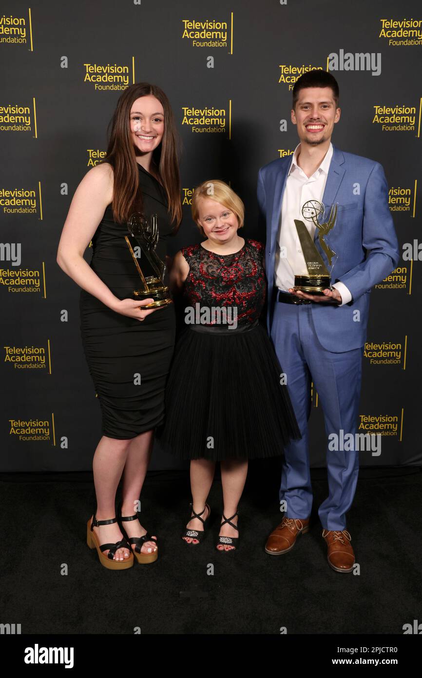 Lauren Potter, center, poses with Anna Rodman, left, and Gabriel Burch ...