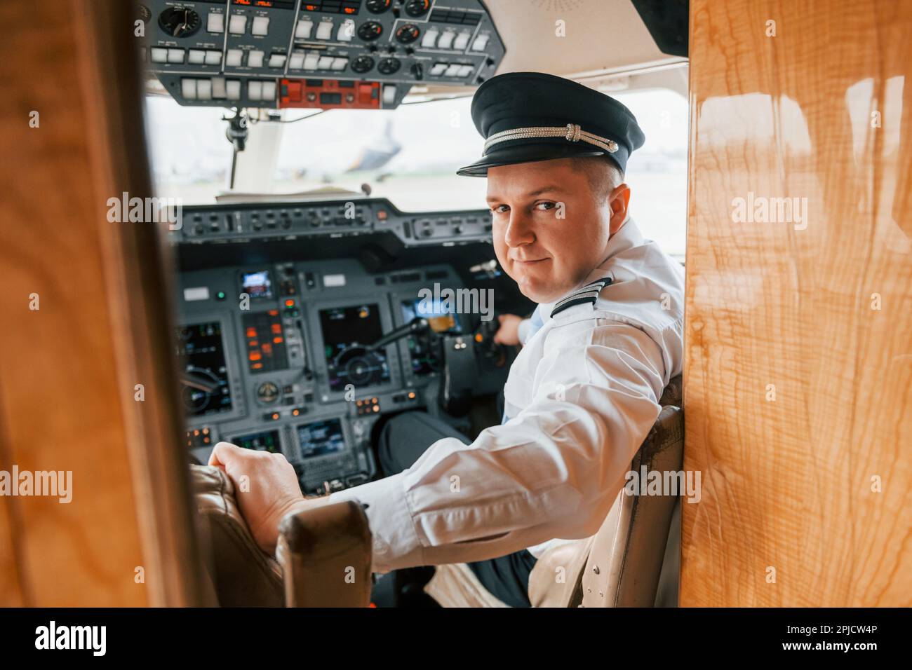 Professional airplane captain preparing flight hi-res stock photography ...