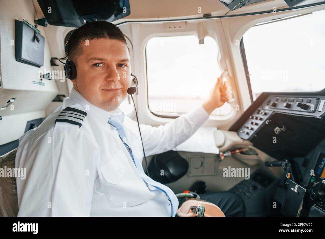 Pilot on the work in the passenger airplane. Preparing for takeoff ...