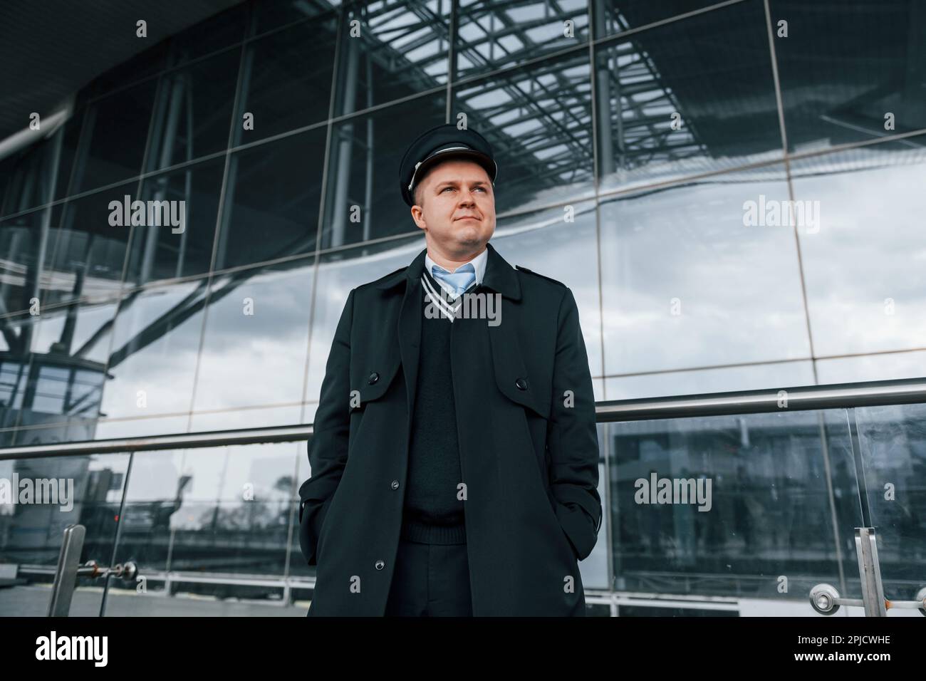 Joyful aircraft pilot standing hi-res stock photography and images - Alamy