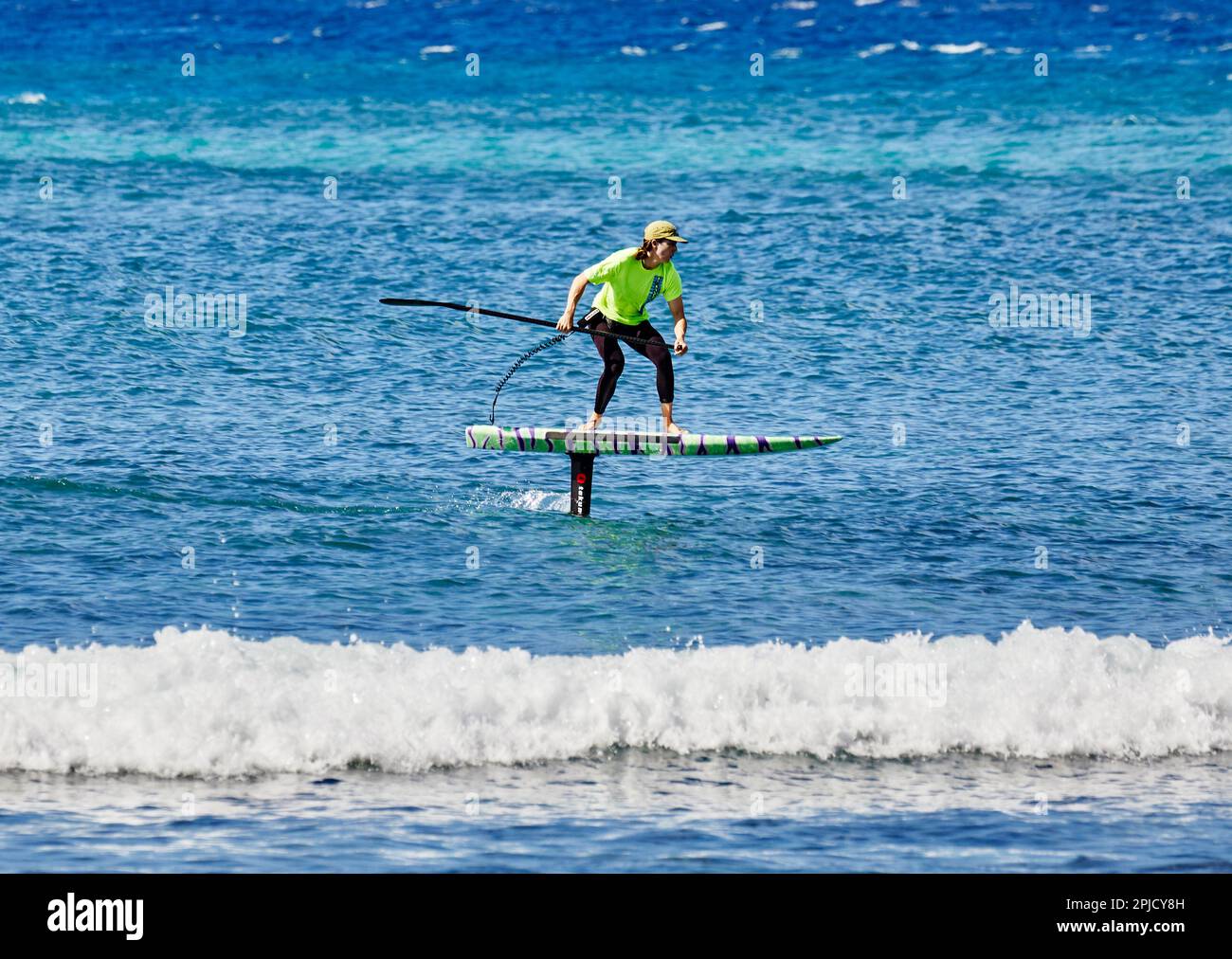 Oahu, Hawaii, USA, - February 6, 2023: Adult Woman on an Electric ...
