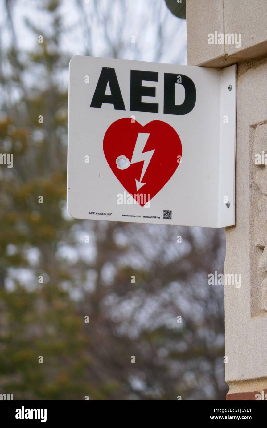 Automatic emergency defibrillator sign Stock Photo - Alamy