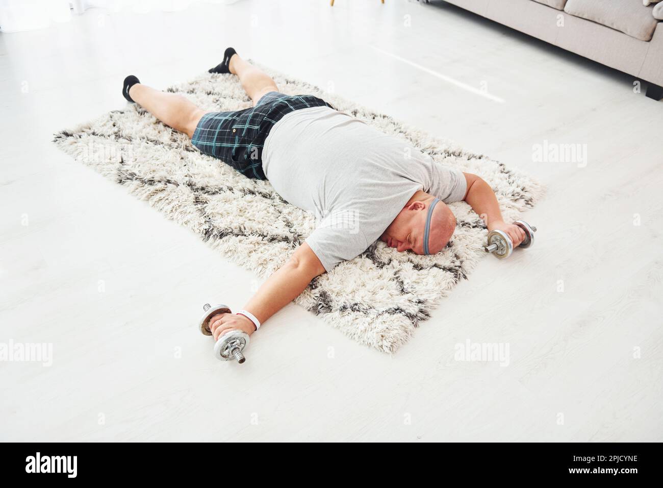 Fat man exercise clothes hi-res stock photography and images - Alamy